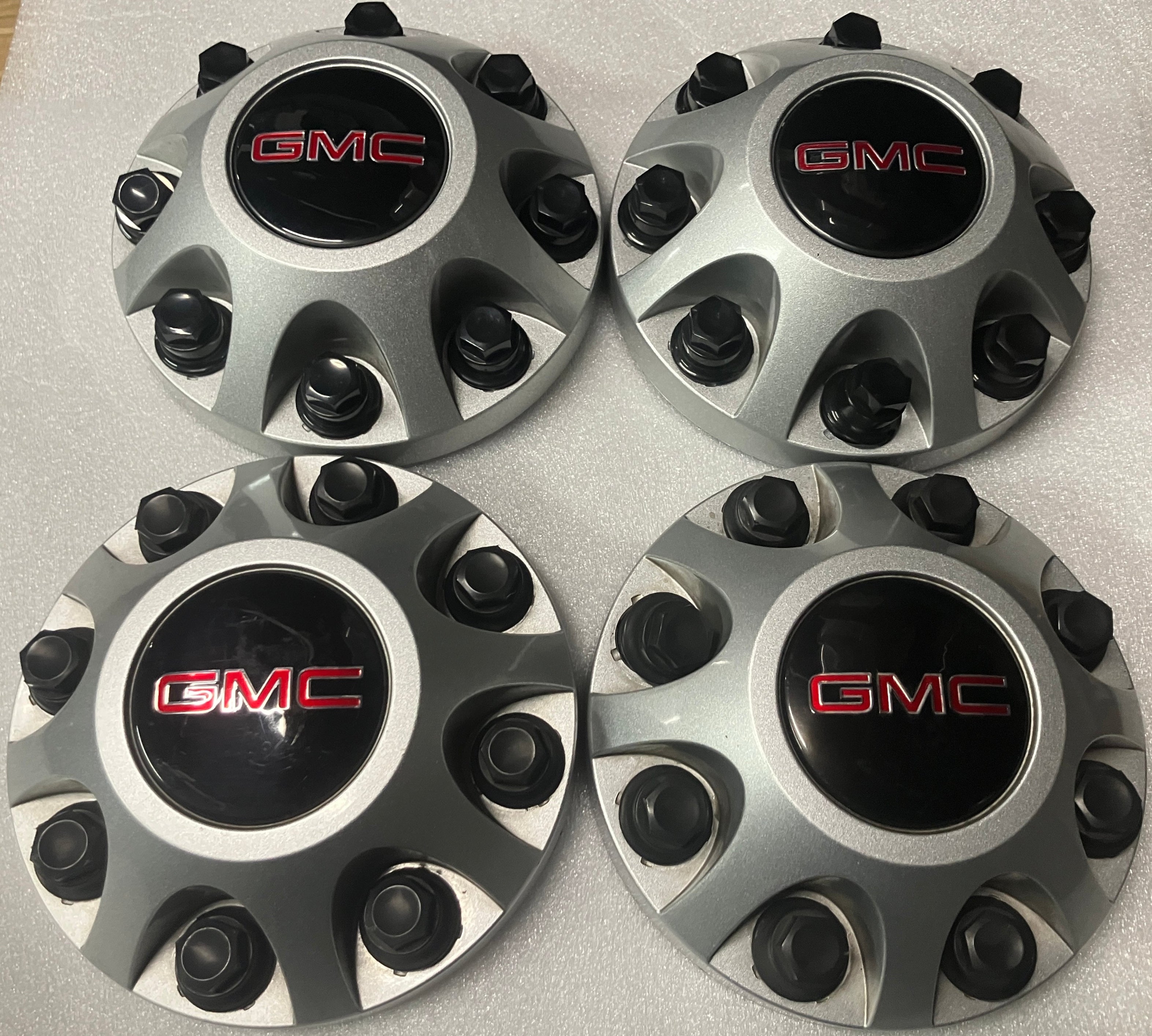 Full Set of 4 GMC Sierra 2500 center caps silver 9597819 – Socal Wheels
